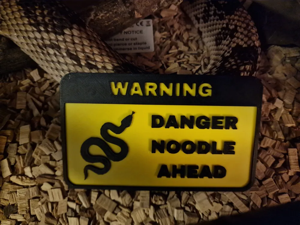 Danger noodle sign / magnet by demonicdrummerboy MakerWorld: Download ...