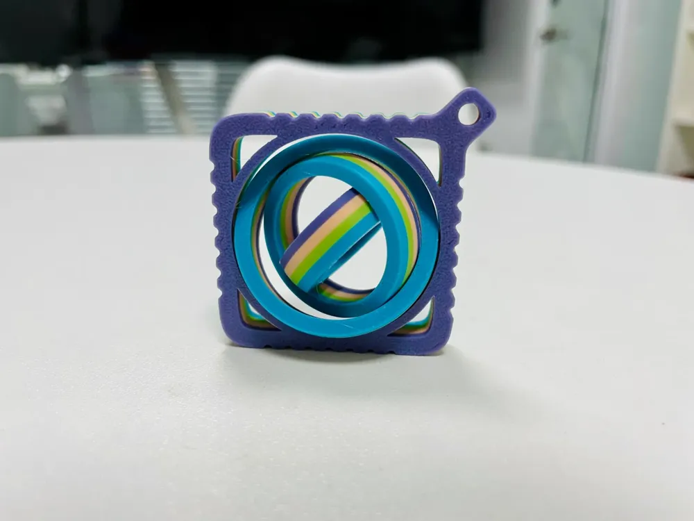 Three-axis rotating fidget keychain toy by Someone - MakerWorld