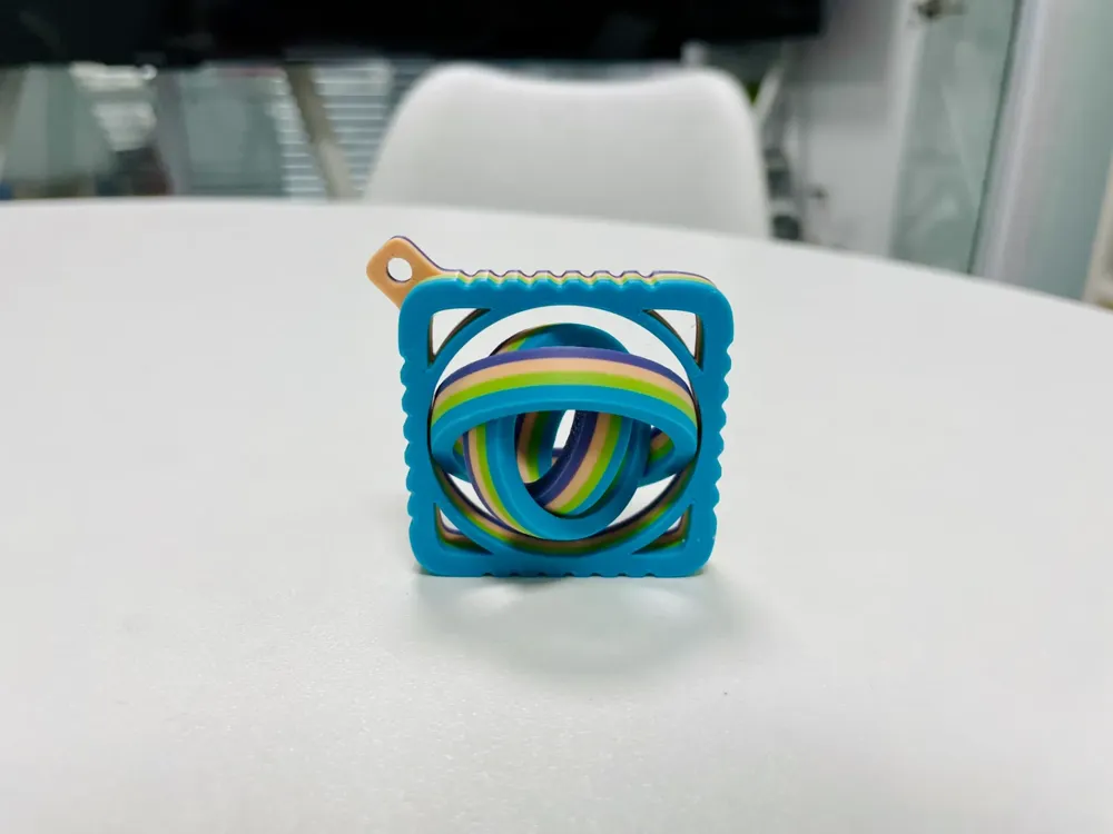 Three-axis rotating fidget keychain toy by Someone - MakerWorld