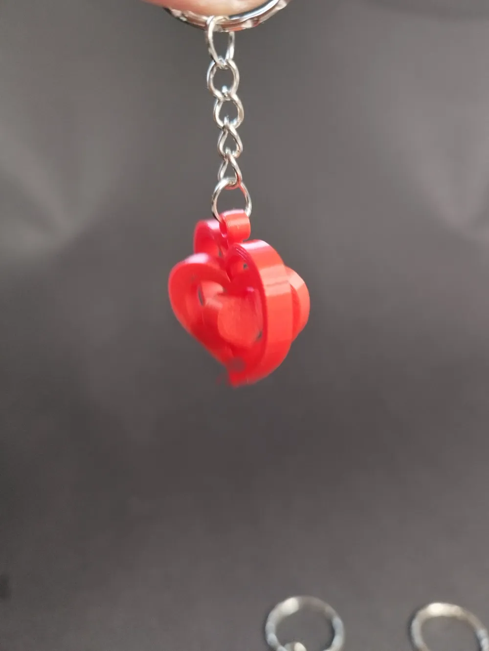 Rotating Hearts Keychain - Free 3D Print Model - MakerWorld
