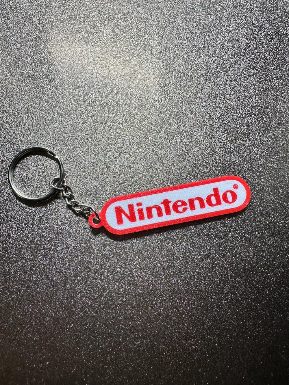 nintendo logo keychain by luciano.brek - MakerWorld