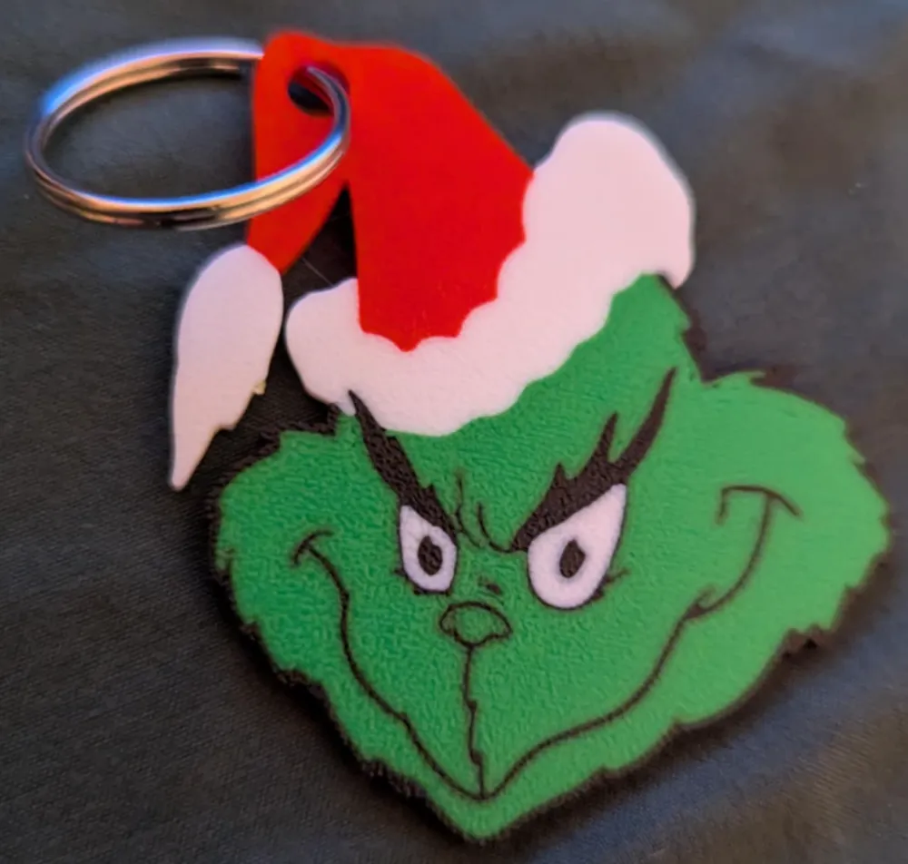 The GRINCH! double sided keychain by c3dp - MakerWorld