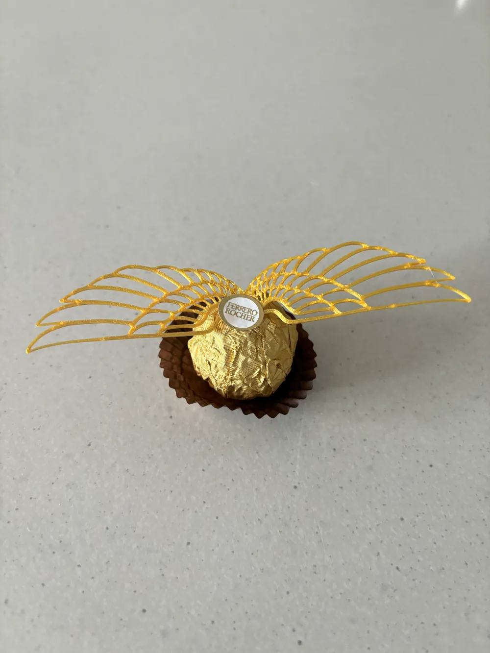 Golden snitch Ferrero Rocher party decoration by shortzzz - MakerWorld