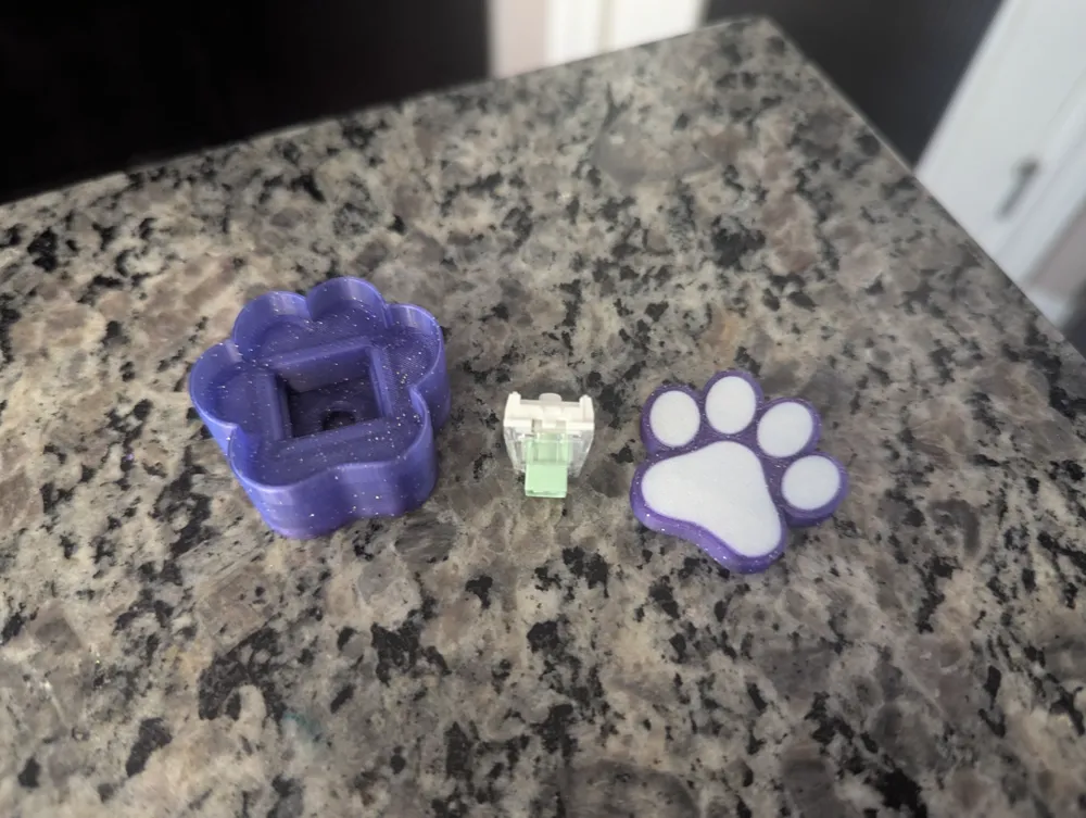 Pawprint Clicker - Free 3D Print Model - MakerWorld