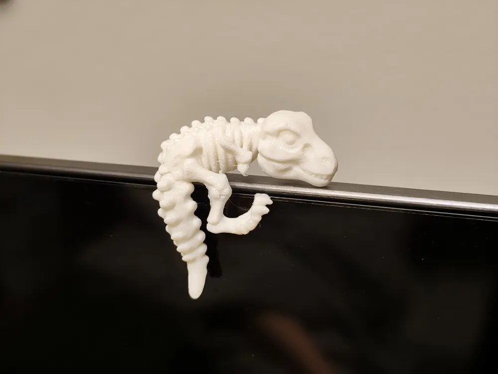 Sleepy T-Rex Skeleton Monitor Buddy - Free 3D Print Model - MakerWorld