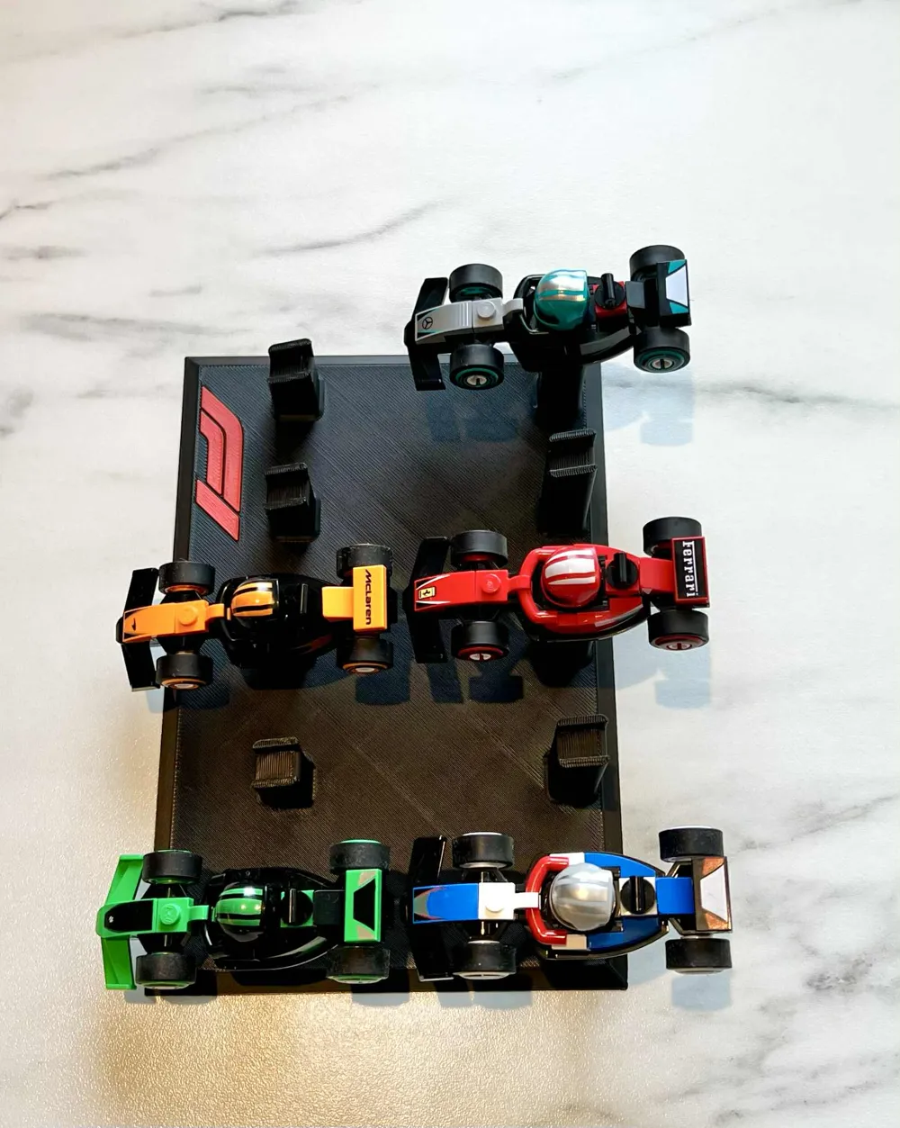 Mini F1 brick stand 10 cars by Tomas1988 MakerWorld: Download Free 3D ...
