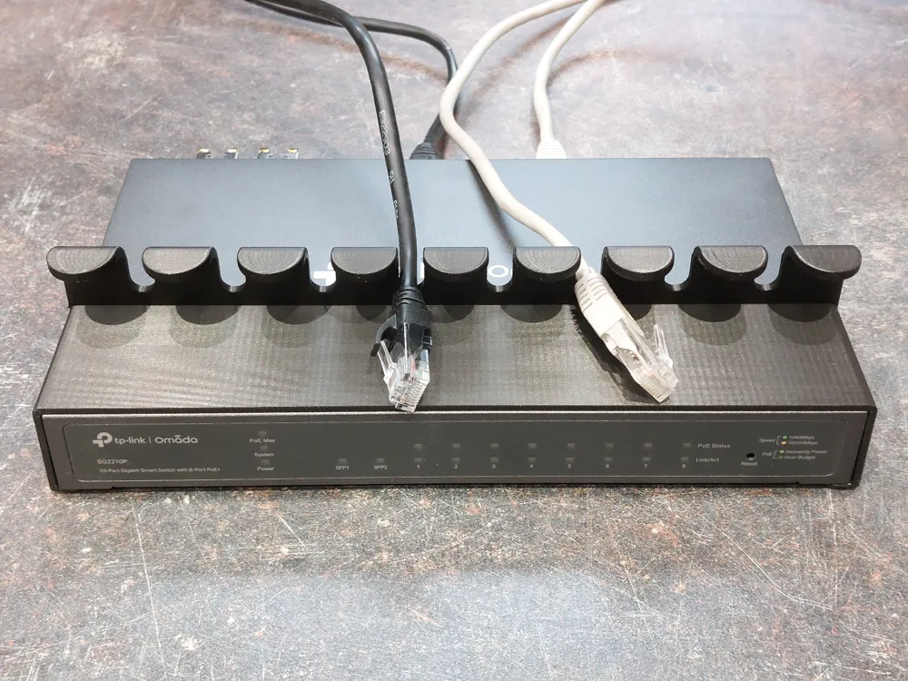 TP-link SG2210P patch cable holder by PedroKV - MakerWorld