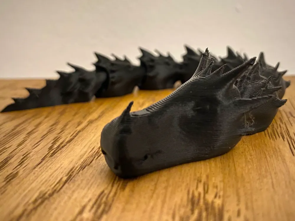 Spiky Articulated Dragon by rhenix - MakerWorld