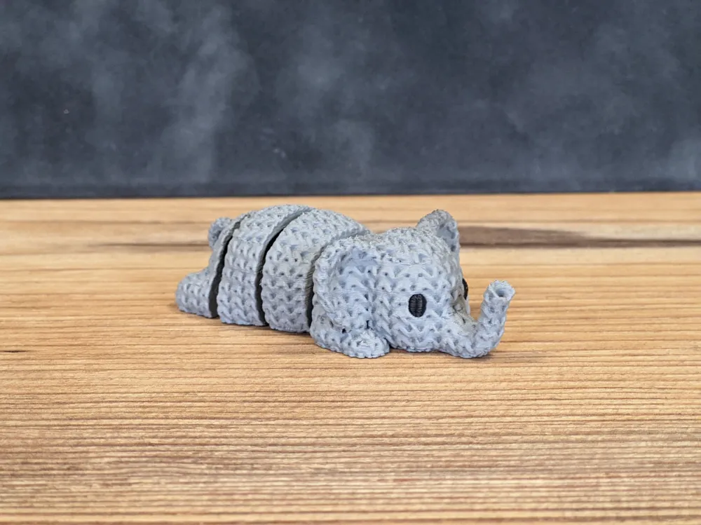 Knitted Articulated Elephant Flexi Keychain by Smoggy3D MakerWorld ...