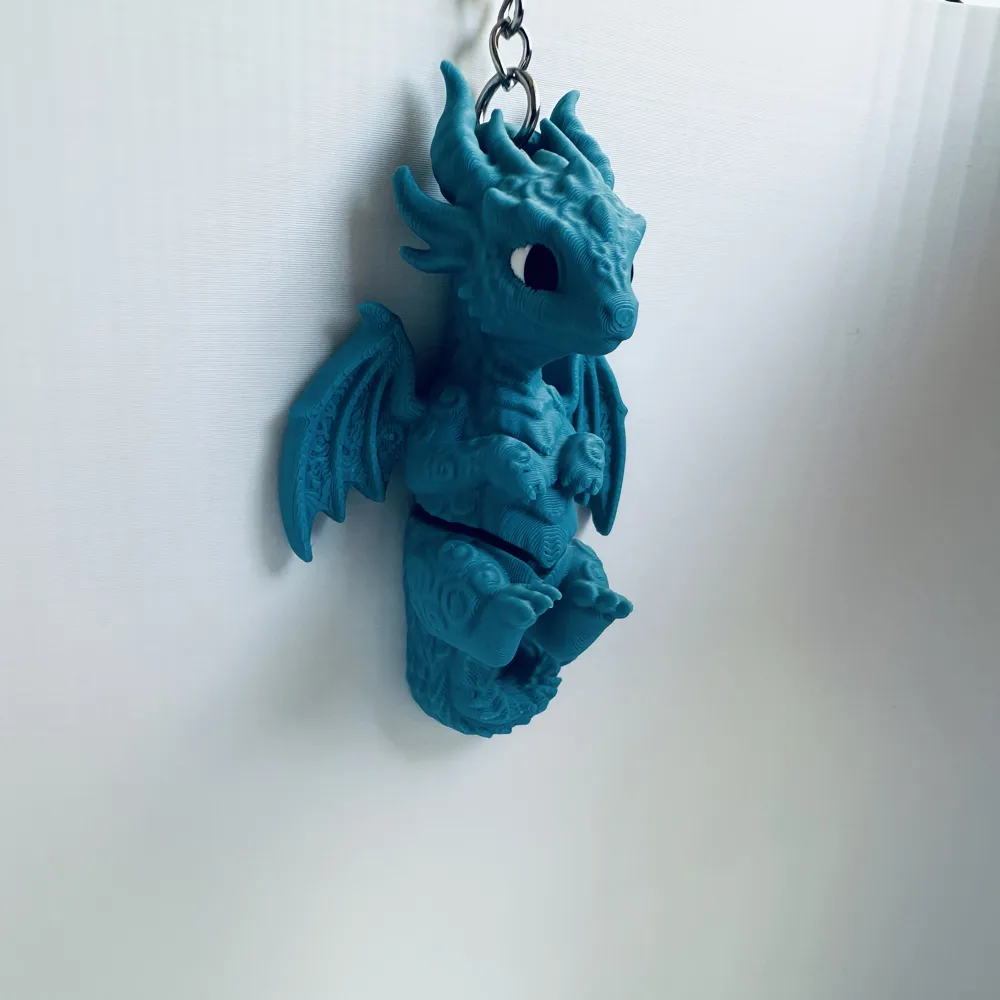 Flexi Azure Dragon Keychain - Free 3D Print Model - MakerWorld