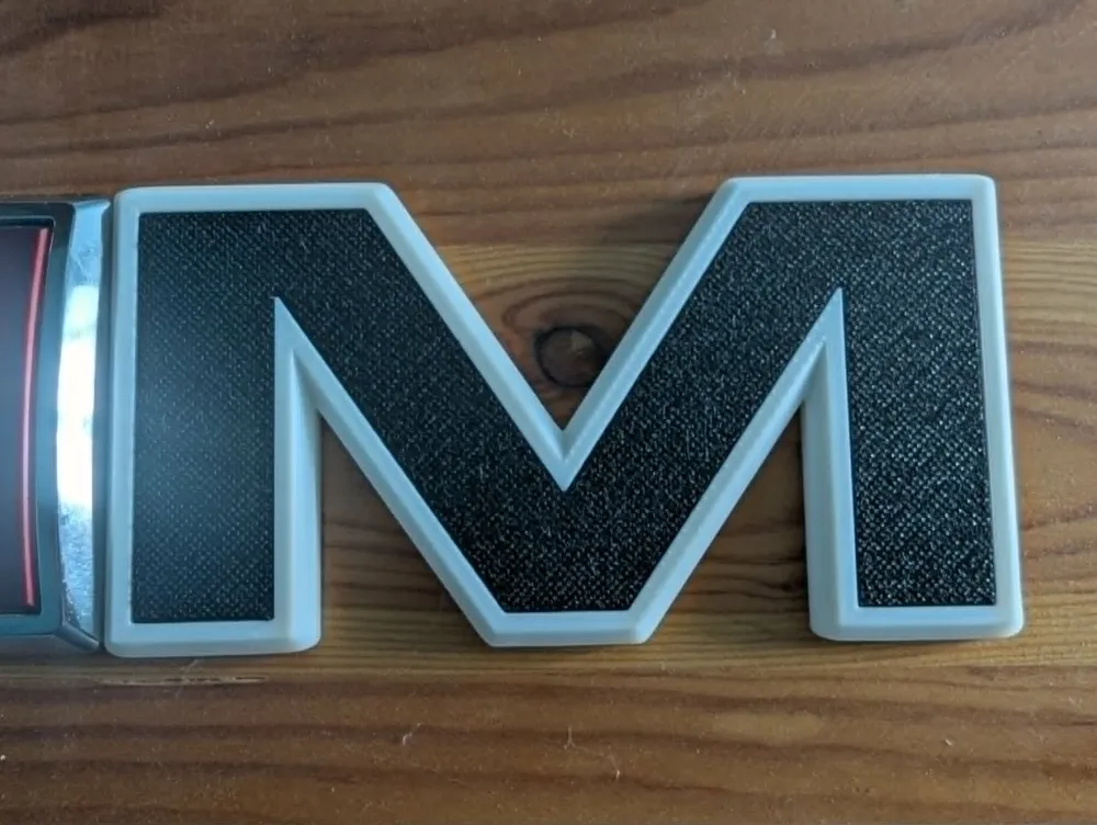 GMC Badge for Sierra T1XX (2019+) - Free 3D Print Model - MakerWorld