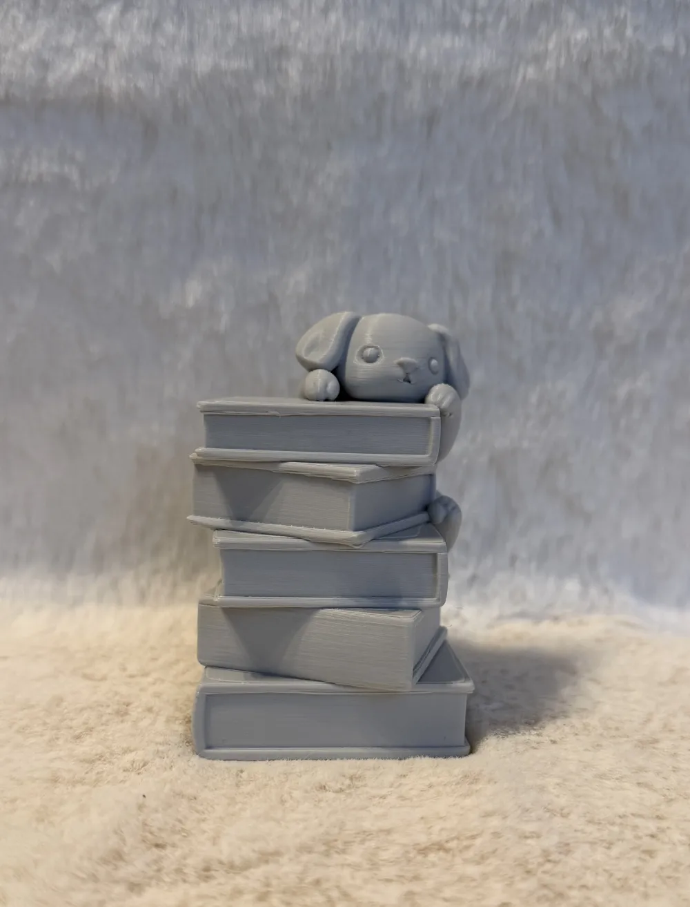 Cute Dog Figurine on a Stack of Books - Free 3D Print Model - MakerWorld
