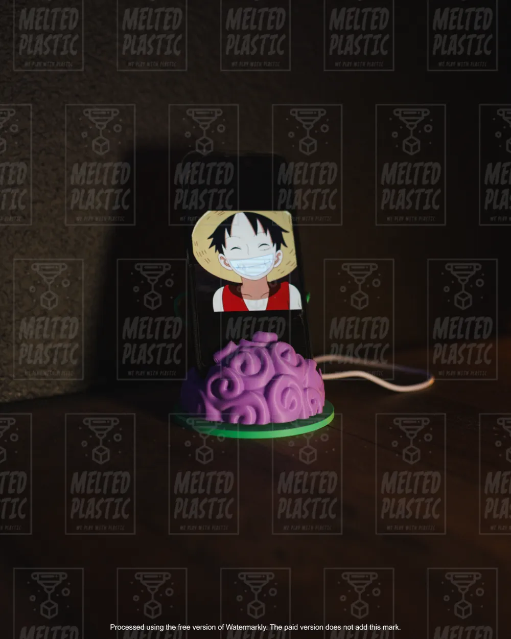 Gomu Gomu Phone Holder / Charger by Melted Plastic MakerWorld: Download Free 3D Models