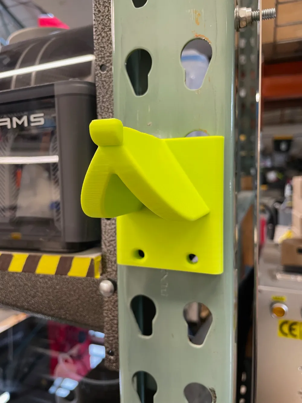 Pallet rack tape roll/gun hanger by Greedo - MakerWorld