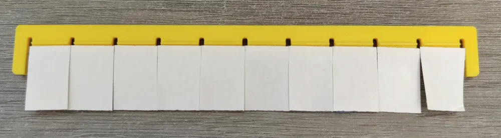 Adhesive angled filament clip with double-sided tape cutting jig by ...