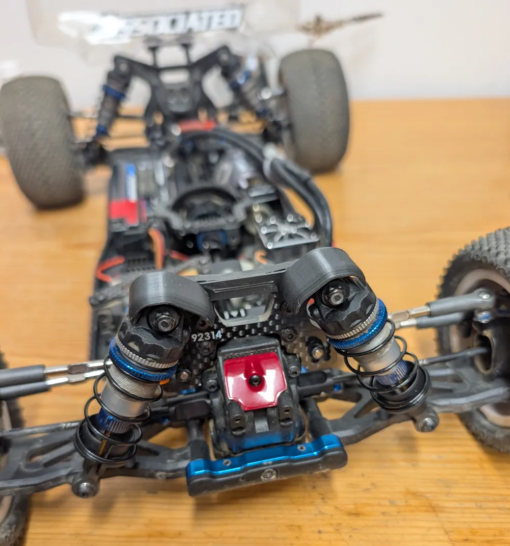 RC10B74.2 Front shock tower protector - Free 3D Print Model - MakerWorld