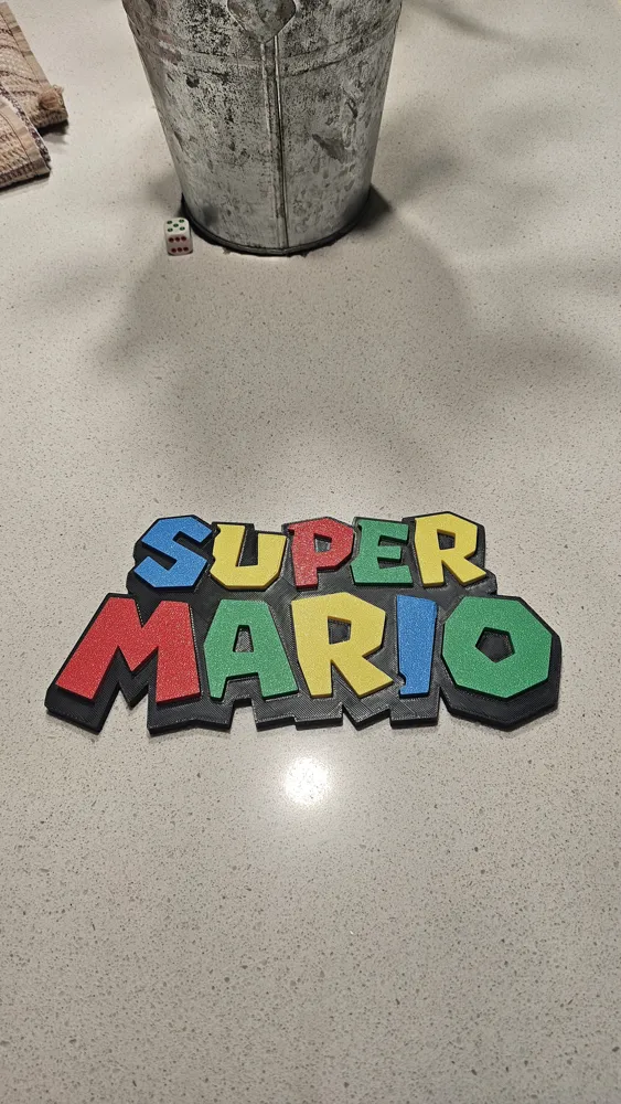 Super Mario logo Multipart cutout - Free 3D Print Model - MakerWorld