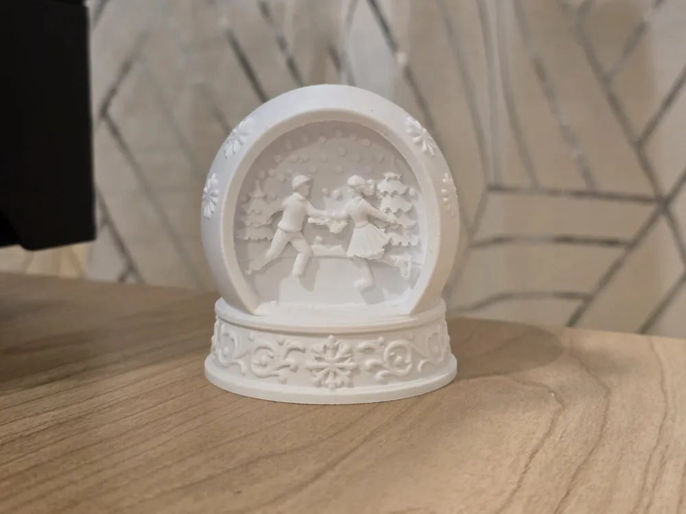 Snow globe with romantic ice skaters - Free 3D Print Model - MakerWorld