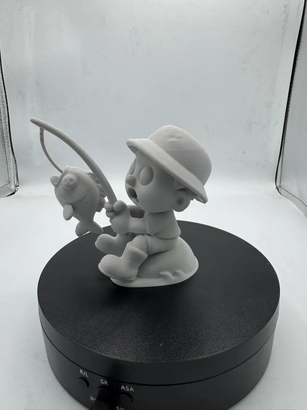 Cute Chibi Fisherman catching a fish - Free 3D Print Model - MakerWorld