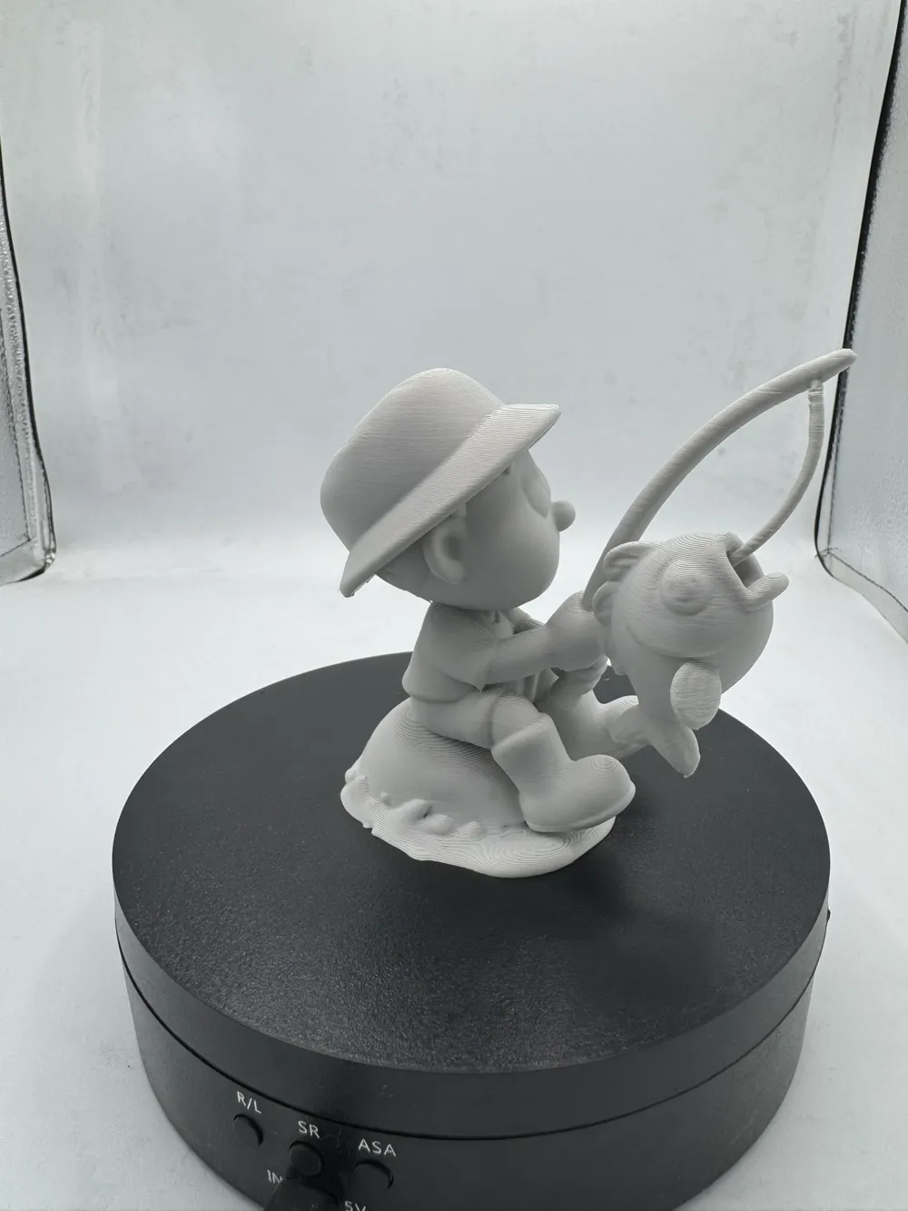 Cute Chibi Fisherman catching a fish - Free 3D Print Model - MakerWorld