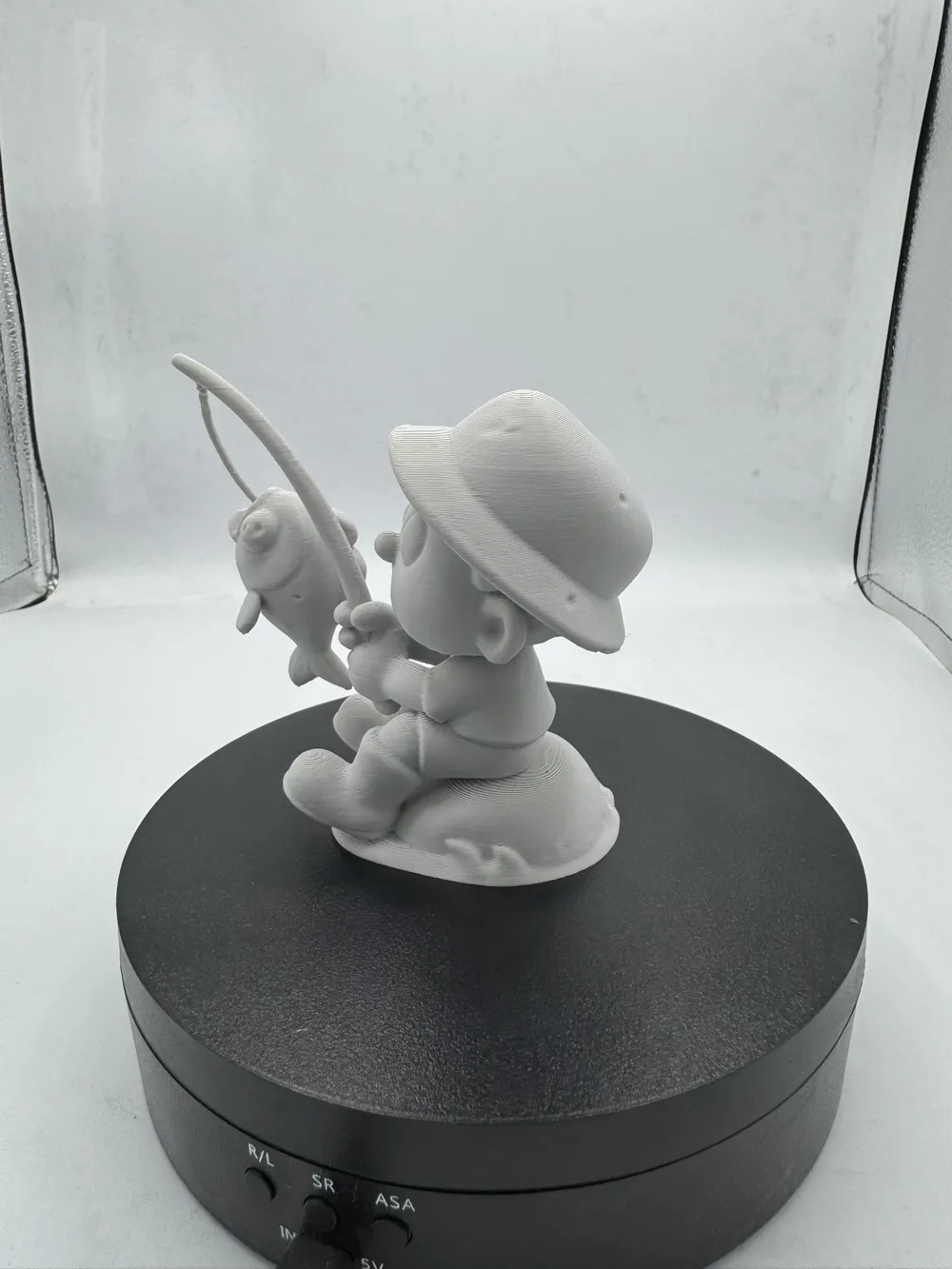 Cute Chibi Fisherman catching a fish - Free 3D Print Model - MakerWorld