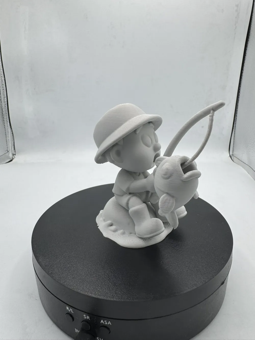 Cute Chibi Fisherman catching a fish - Free 3D Print Model - MakerWorld