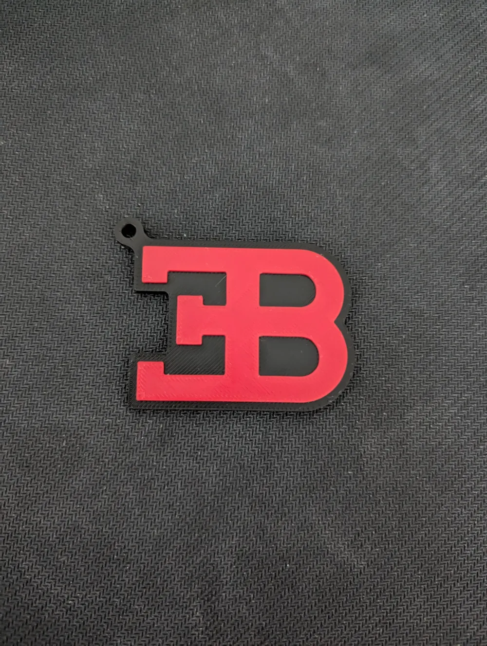 Bugatti logo keychain by Dava MakerWorld: Download Free 3D Models