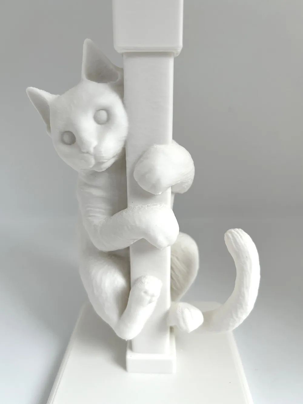 Clingy Cat Headphone Stand - Free 3D Print Model - MakerWorld