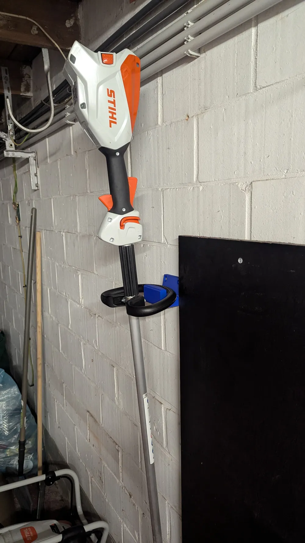 Stihl lawn trimmer wall hook by 0phoff MakerWorld: Download Free 3D Models