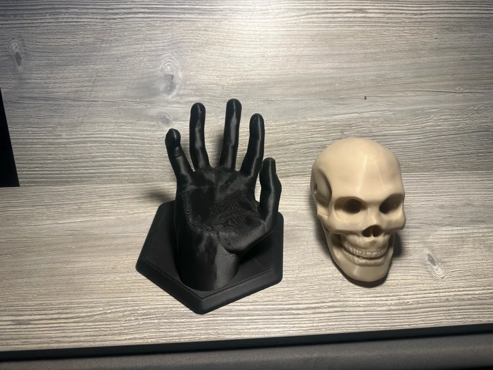 Eternal Embrace: The Hand and Skull Duo by OTL3DPrints - MakerWorld