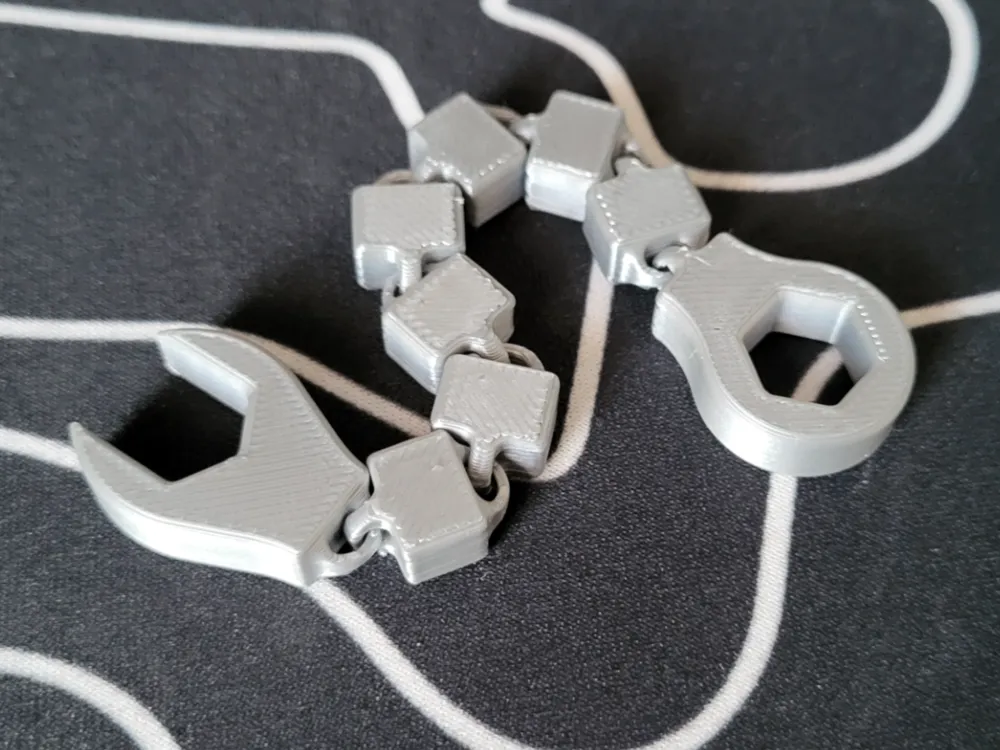 Articulated Wrench - 10mm (3D Printable Tools?) by Brkn3D - MakerWorld