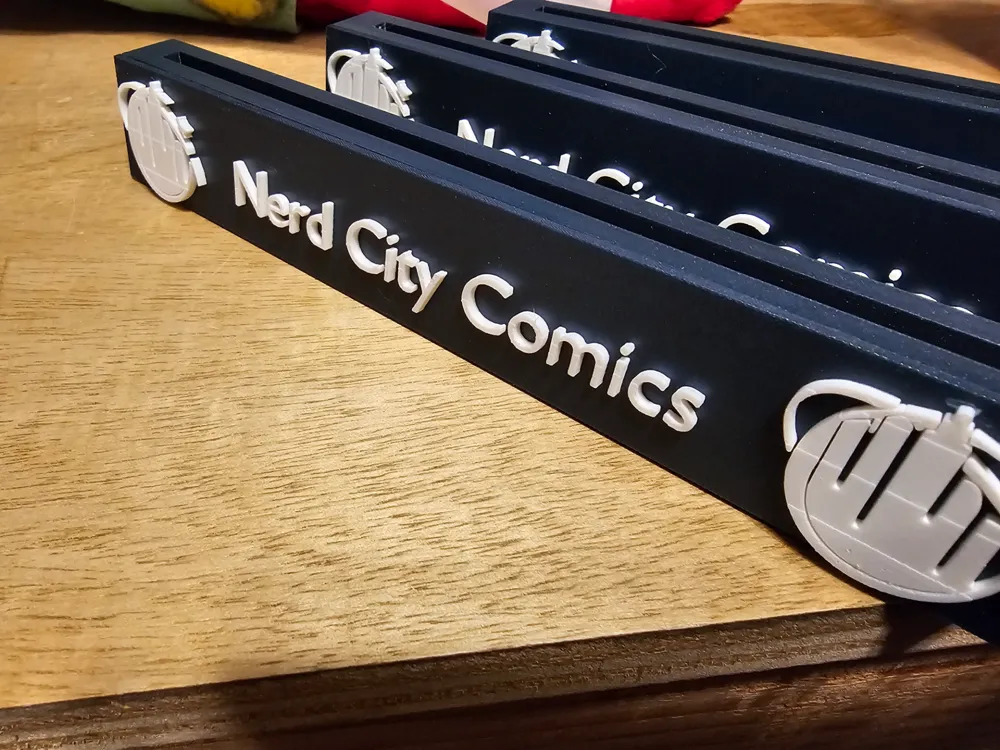Comic Book Stand Plate - Nerd City Comics by gregory.donnell74 - MakerWorld