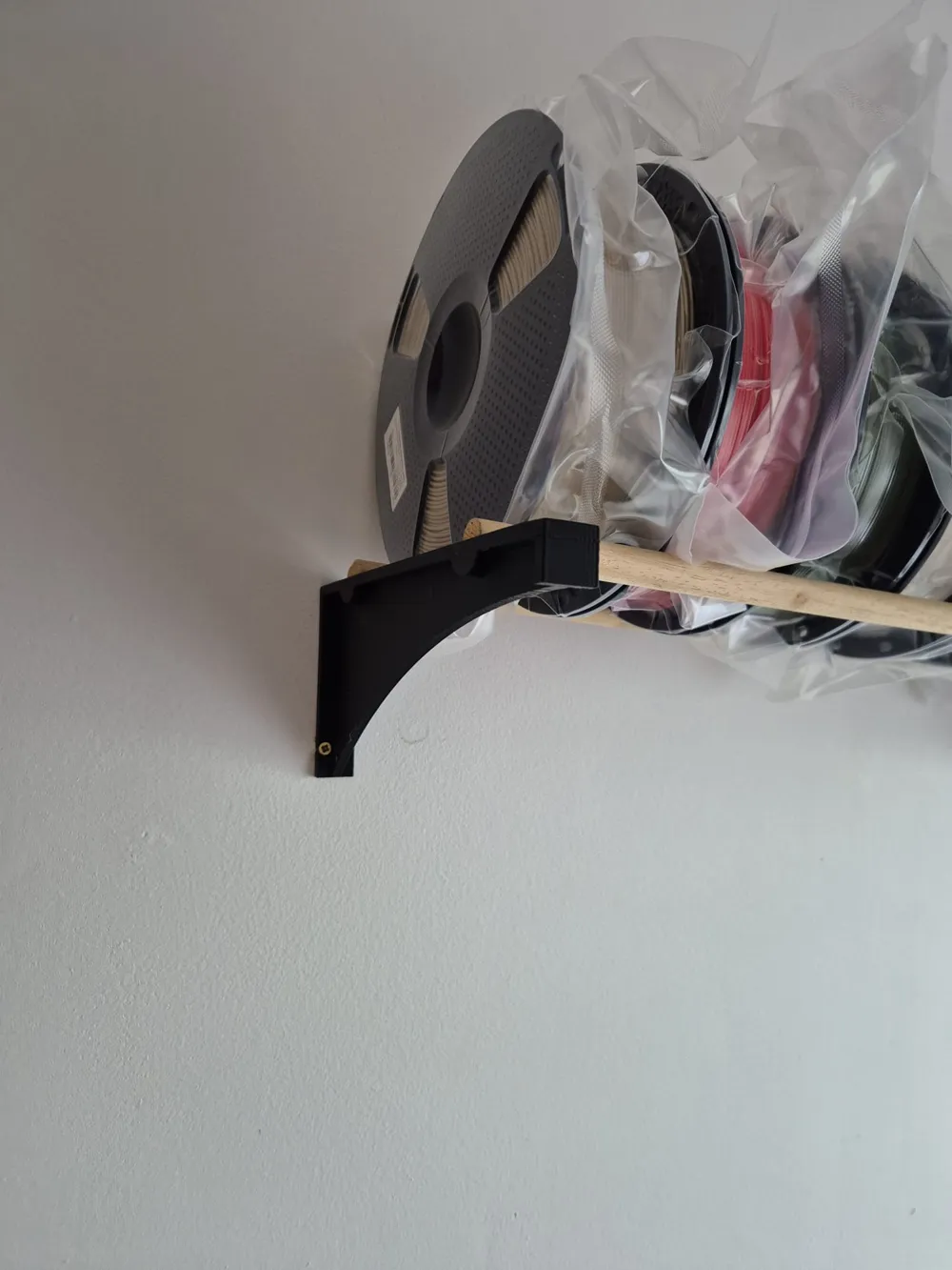 Modular Wall-Mounted Filament Spool Rack - Free 3D Print Model - MakerWorld