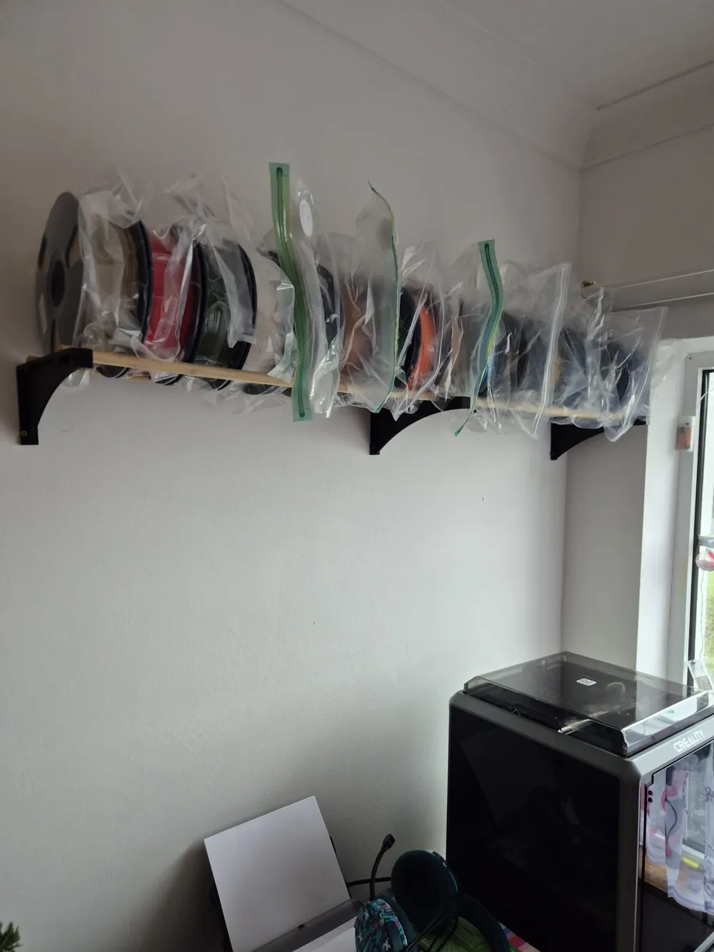 Modular Wall-Mounted Filament Spool Rack - Free 3D Print Model - MakerWorld