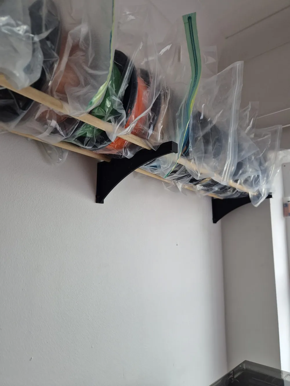 Modular Wall-Mounted Filament Spool Rack - Free 3D Print Model - MakerWorld