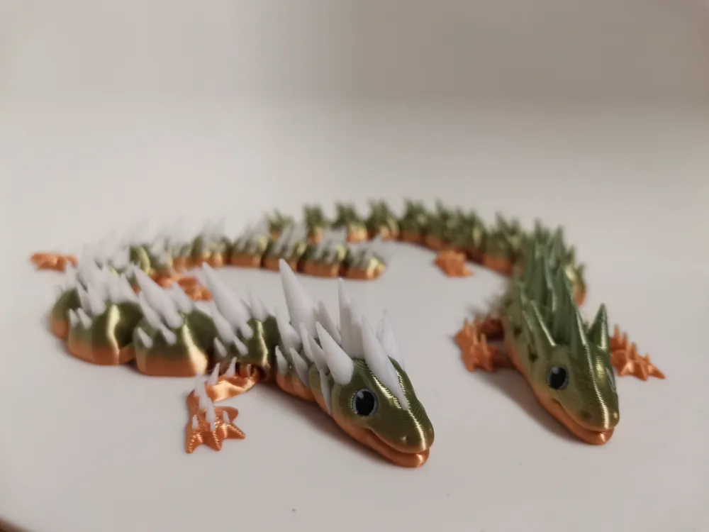 Cute multicolor articulated spikey dragon by BT3D printing MakerWorld: Download Free 3D Models