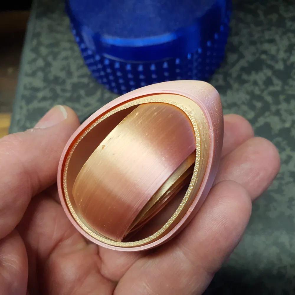 rotating egg 7 shells by yahbluez - MakerWorld