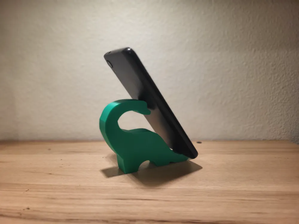 Dinosaur Phone Stand by BD PrintingMakerWorld: Download Free 3D Models