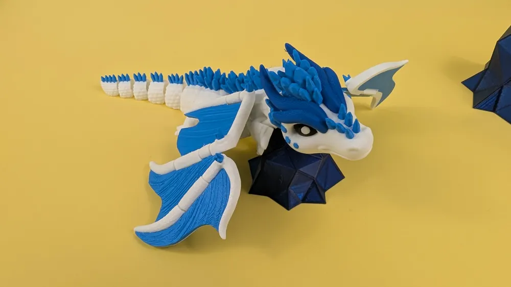 Elder Ice Dragon - Flexi Toy Figure - Free 3D Print Model - MakerWorld