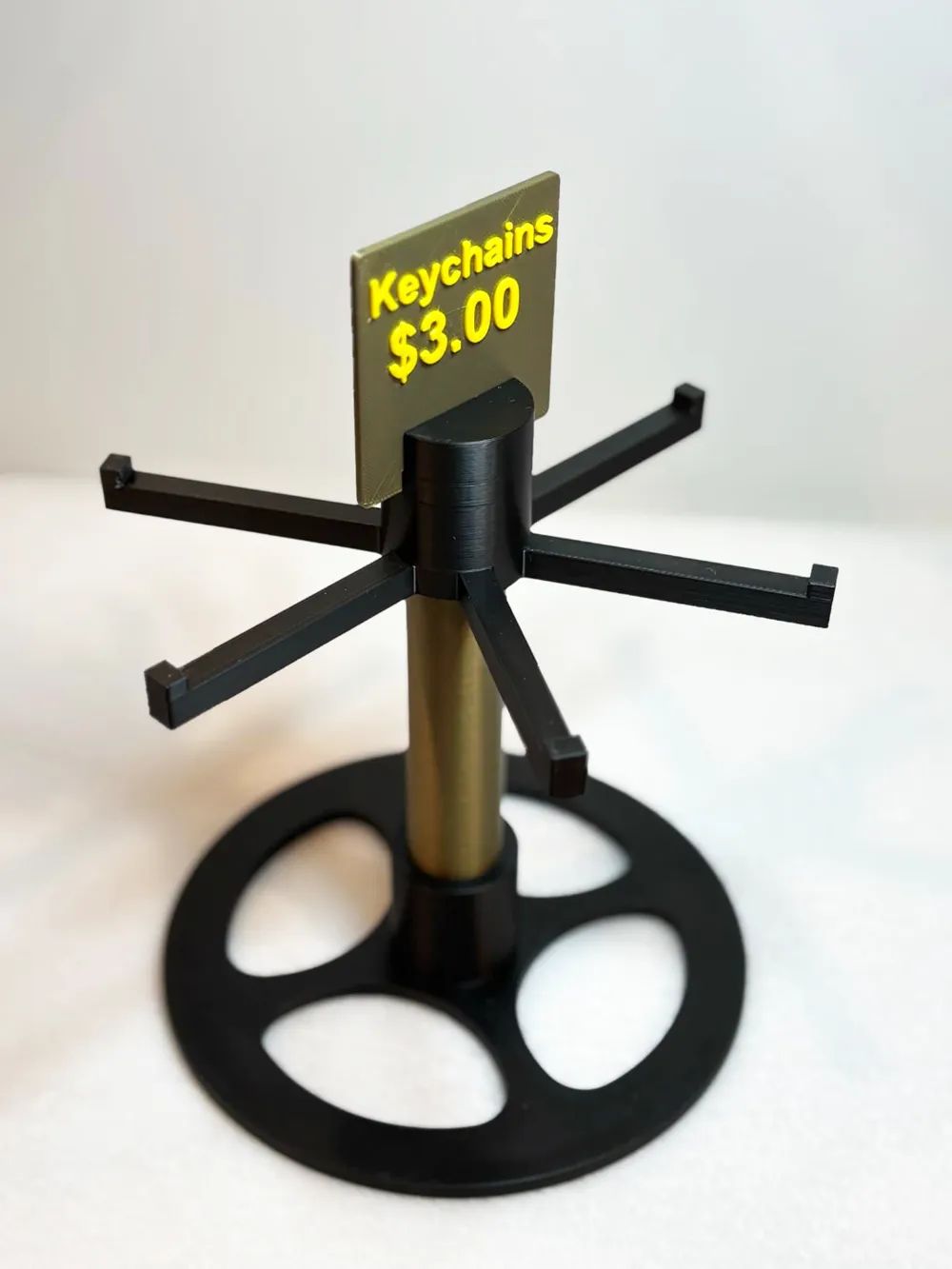 Spinning keychain display stand customizable by Tinker Link MakerWorld ...