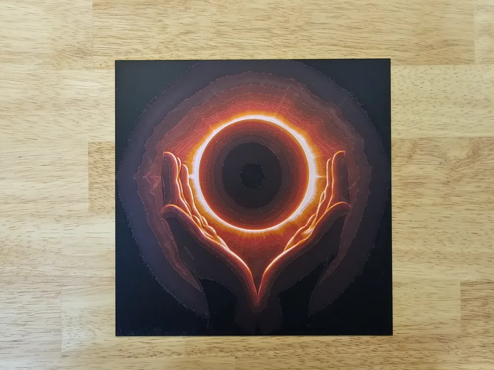 Solar Eclipse In Hands Hueforge by Joe - MakerWorld