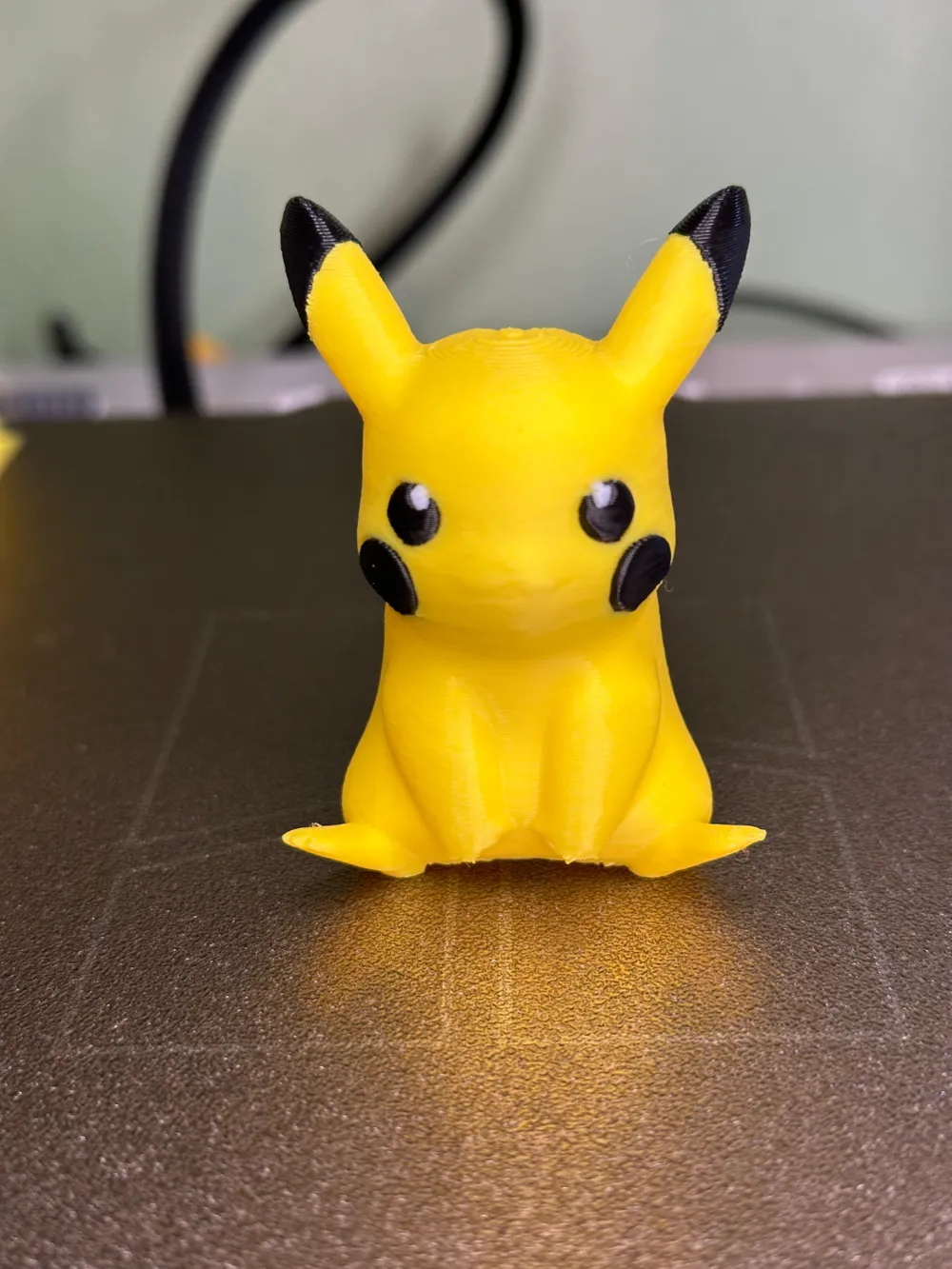Pikachu Pokémon sitting on the print head by DESMOANGY - MakerWorld