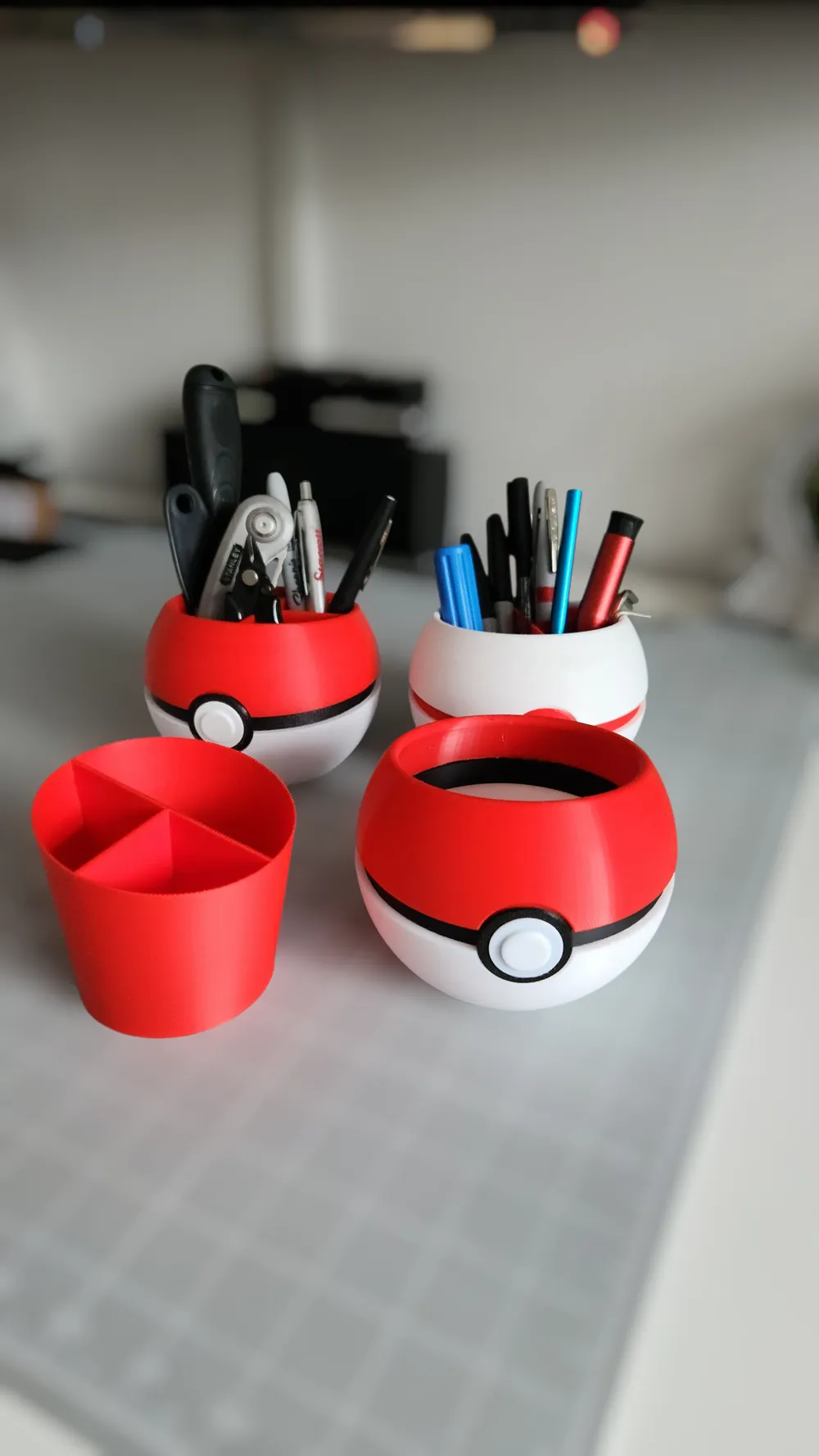Pokeball desk organiser by j89 MakerWorld: Download Free 3D Models