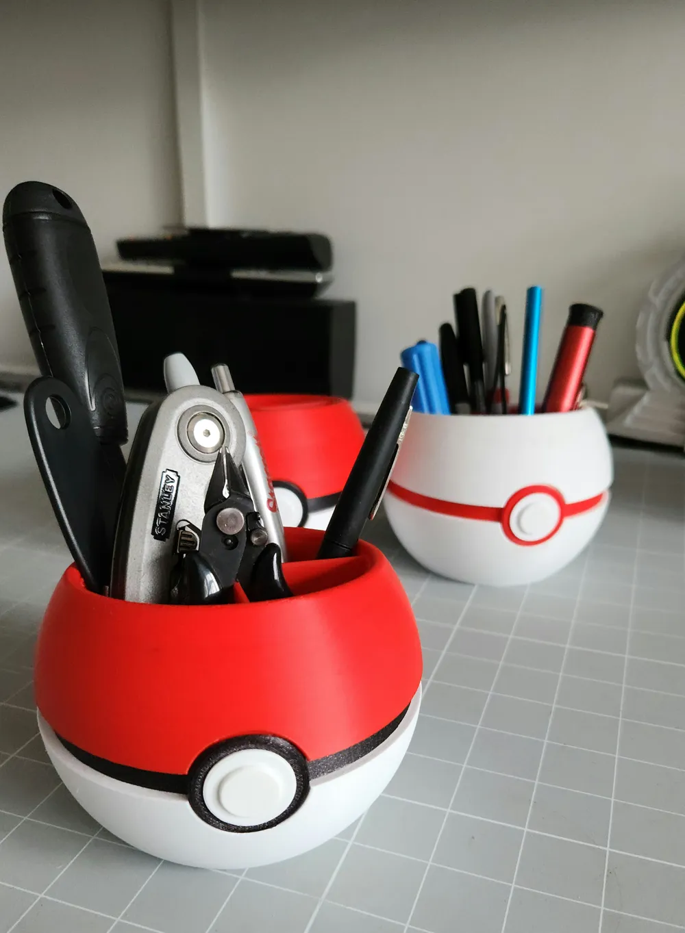 Pokeball desk organiser by j89 MakerWorld: Download Free 3D Models