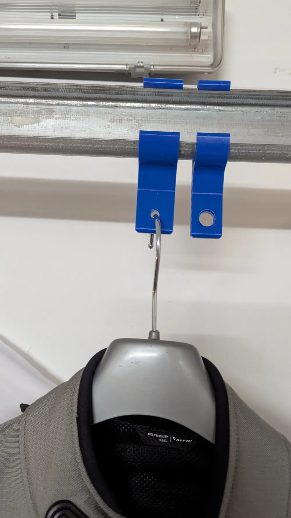 Snap on Garage Door Rail Hanger - Free 3D Print Model - MakerWorld