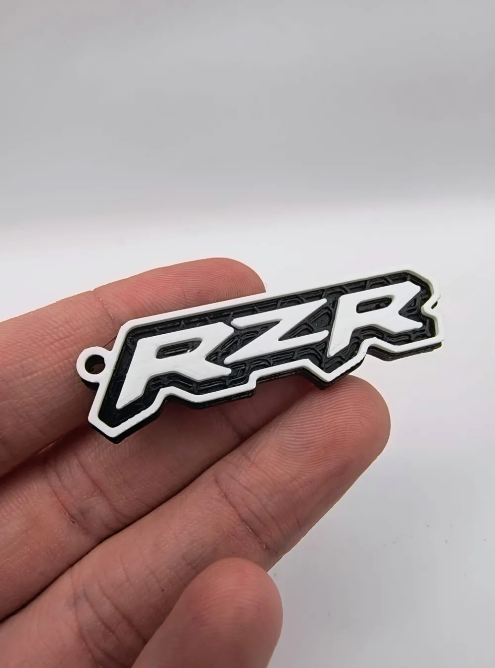 Polaris RZR logo keychain - Free 3D Print Model - MakerWorld