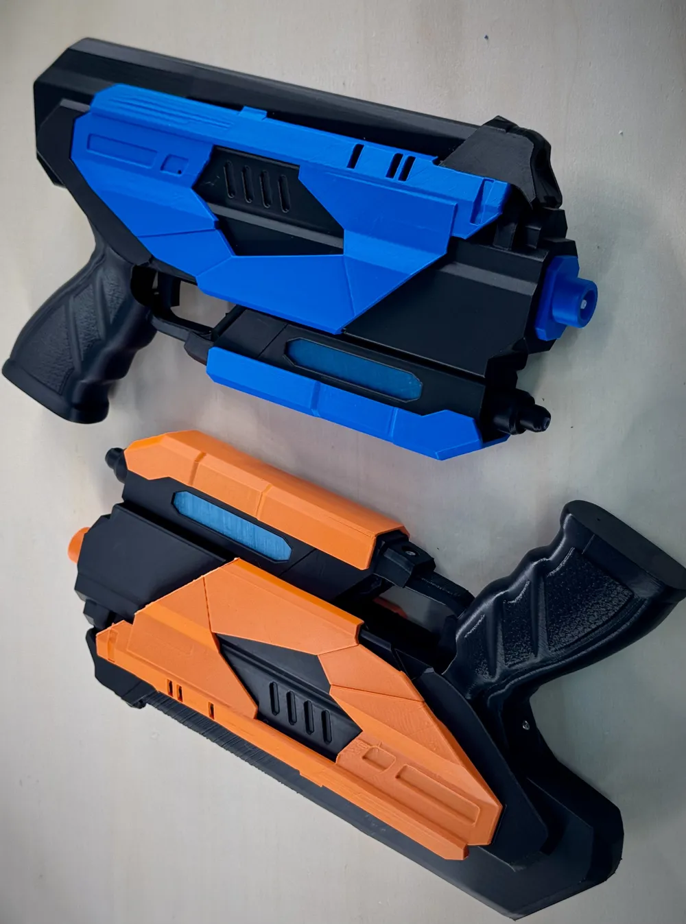 AquaPulse – Sci‑Fi Water Blaster - Free 3D Print Model - MakerWorld