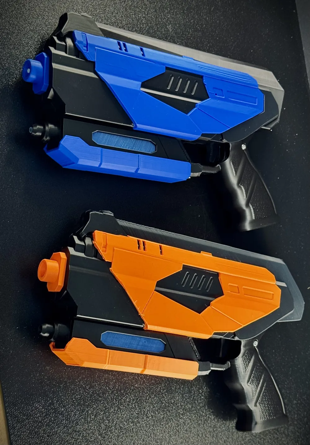 AquaPulse – Sci‑Fi Water Blaster - Free 3D Print Model - MakerWorld