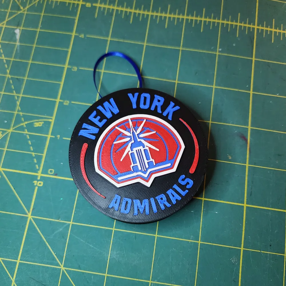 Heated Rivarly Logo & Team Hockey Puck Ornaments by Cosmo Moore ...