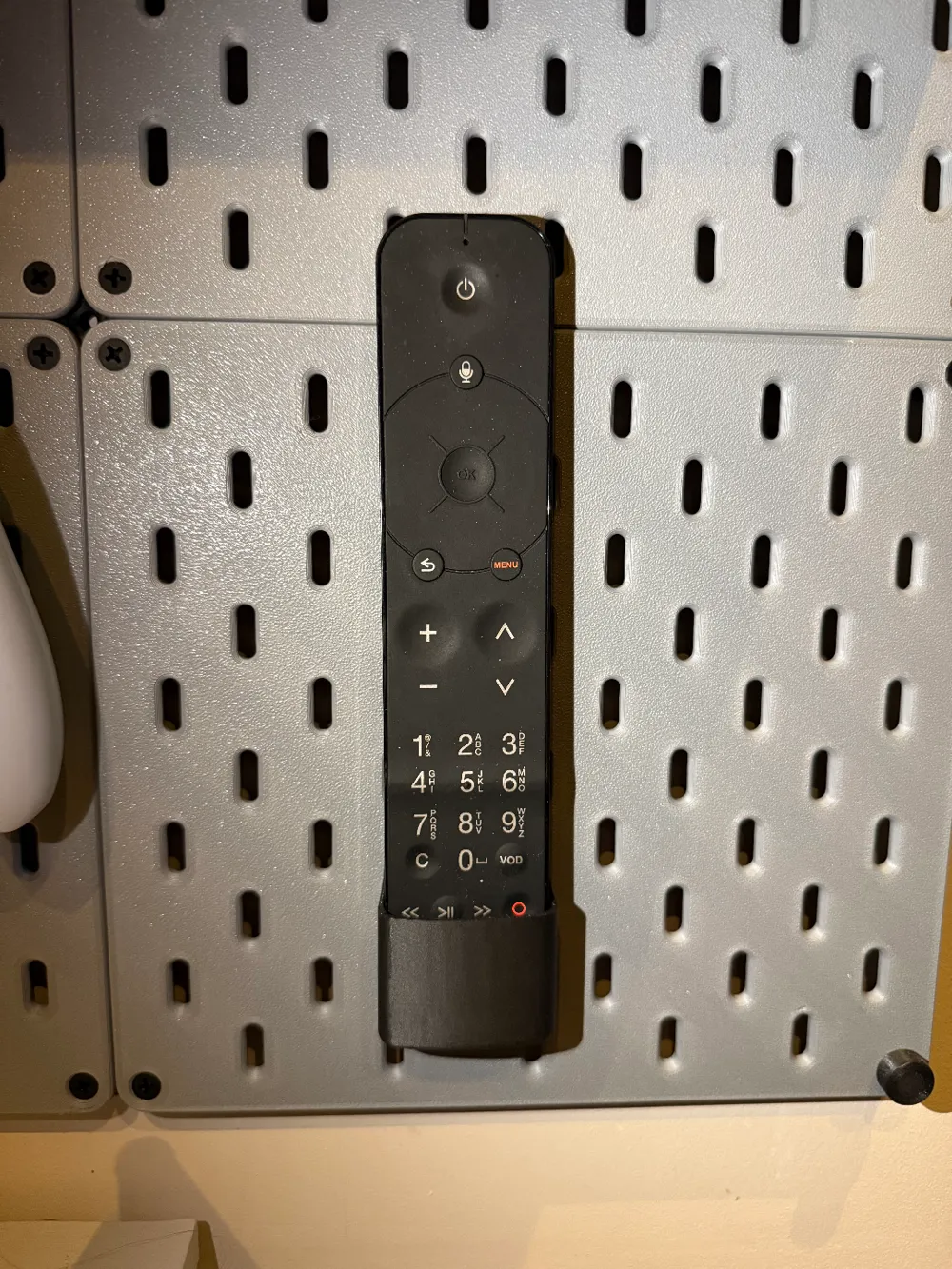Orange remote control holder for Skadis panel by mikaMakerWorld ...